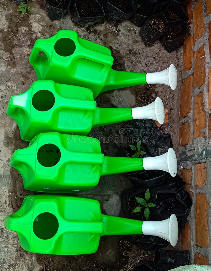 Plant watering tool stock image. Image of font, machine - 226894995