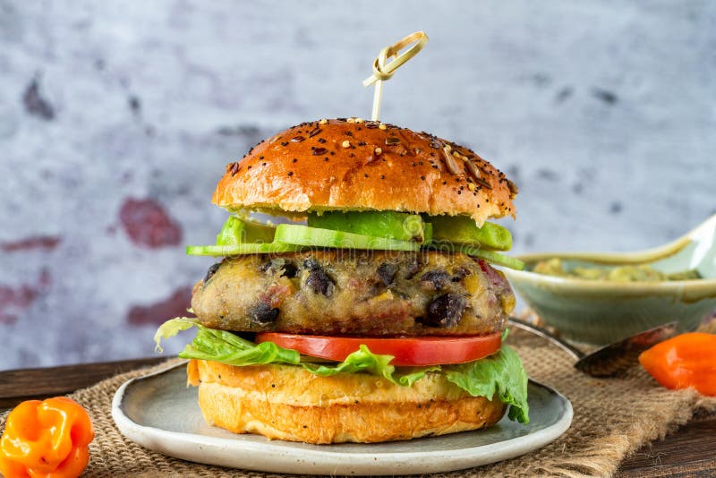 Plantain and bean burger stock photo. Image of grilled - 281581134