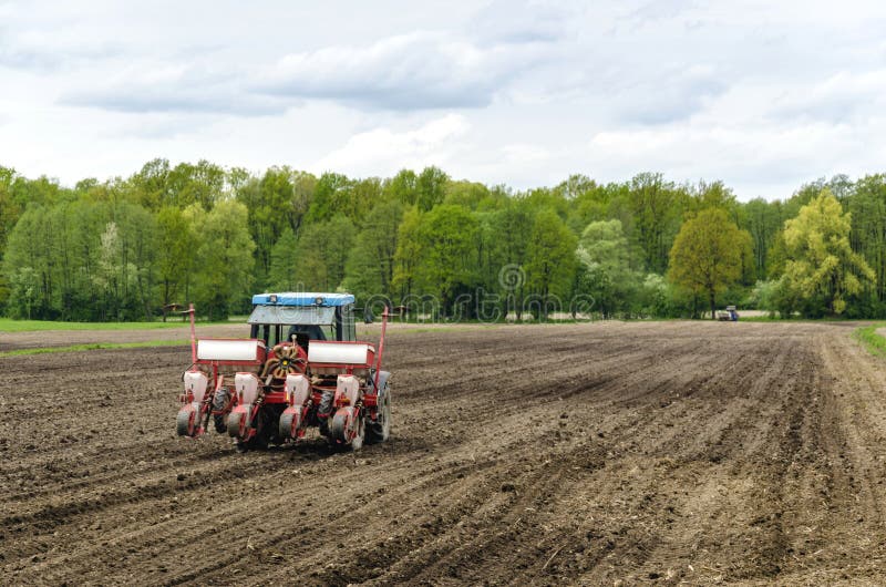 Planting Seeds with Tractor Stock Image - Image of country, tractor ...