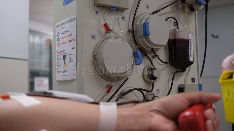 Hands Donating Blood Plasma at Blood Donor Centre. Stock Photo - Image ...
