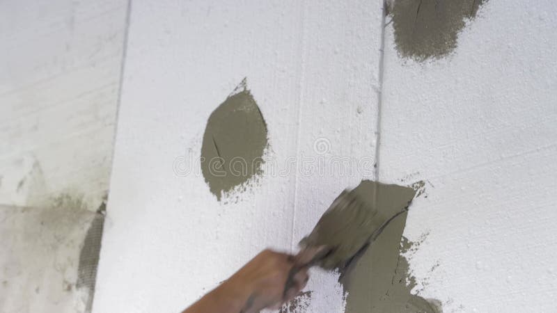 Plaster is Applied To the Foam, Insulation of the Facade of the House ...