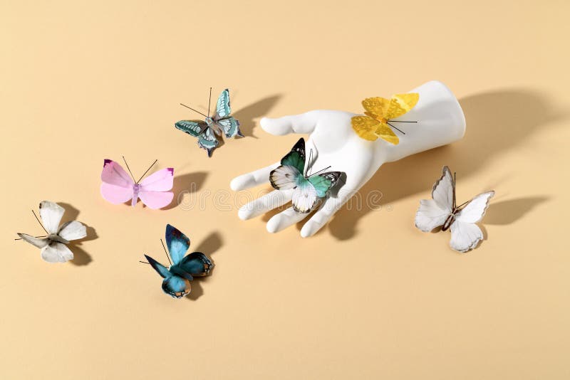 Plaster Hand with Butterflies Stock Photo - Image of fragility ...