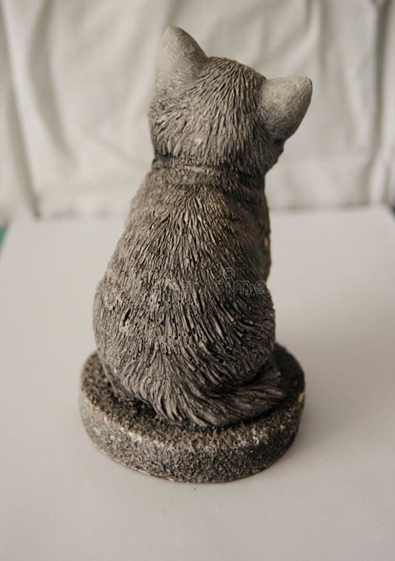 Plaster statuette of a cat stock image. Image of back - 146846811