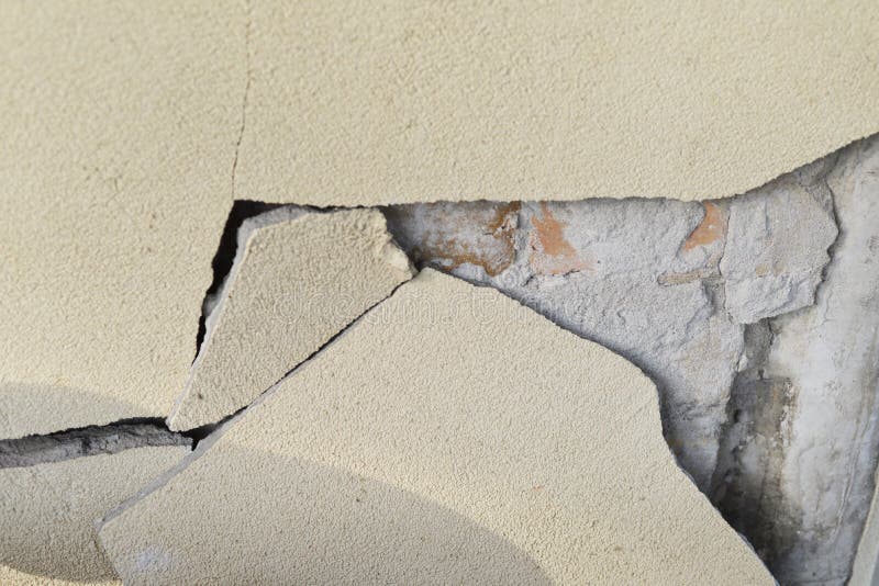 Plaster Wall with Cracks. Building Requiring Repair Stock Photo - Image ...