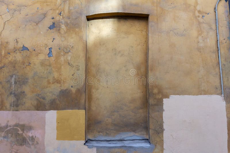 Plastered Old Wall with a False Window in the Form of an Arch and ...