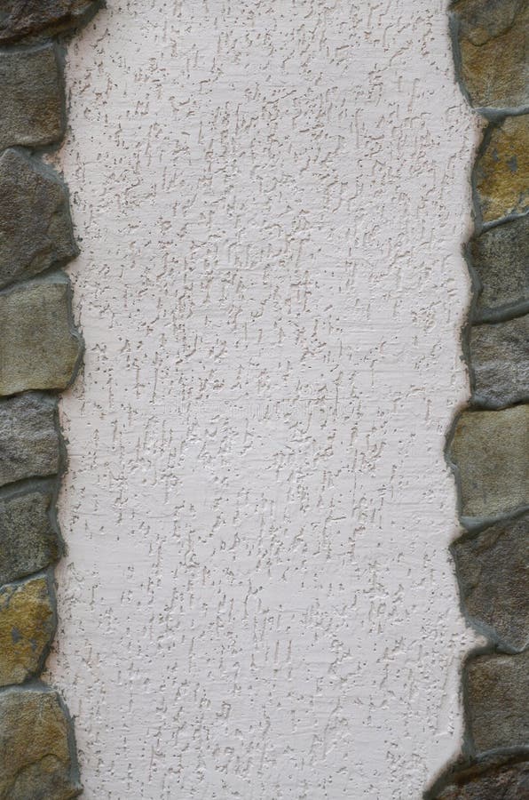 Plastered Concrete Wall with a Frame of Flat Stones Stock Photo - Image ...