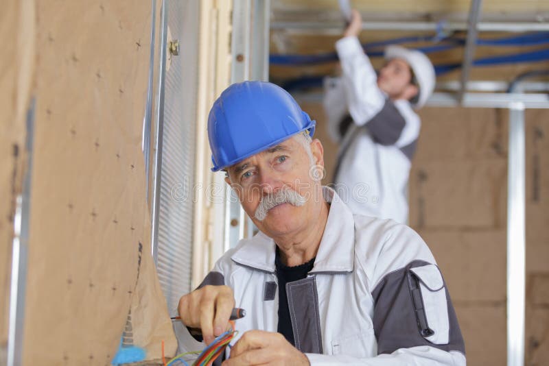 Plasterer Doing Work and Posing Stock Photo - Image of architecture ...