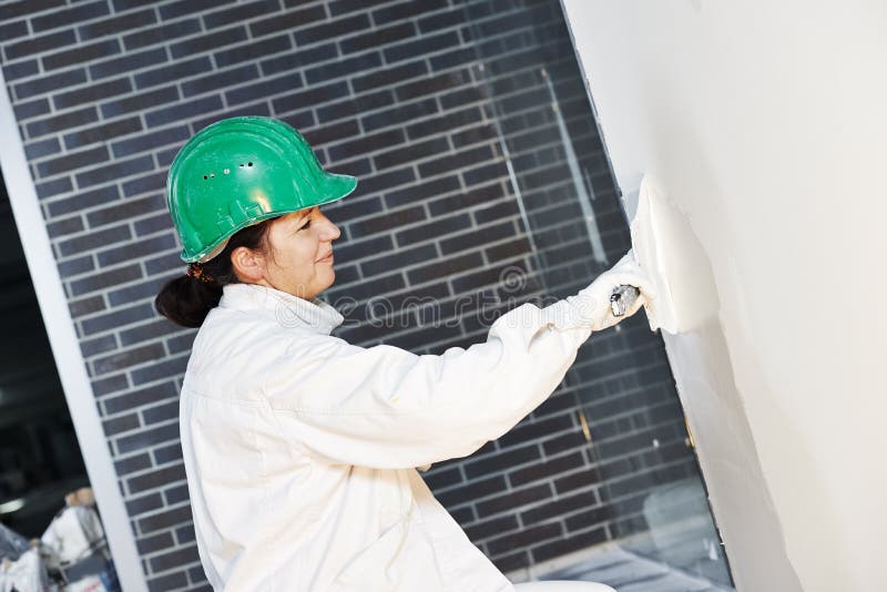 Female plasterer portrait stock photo. Image of plasterer - 44645324