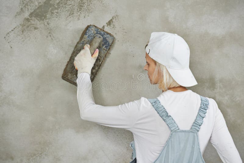Female plasterer portrait stock photo. Image of plasterer - 44645324