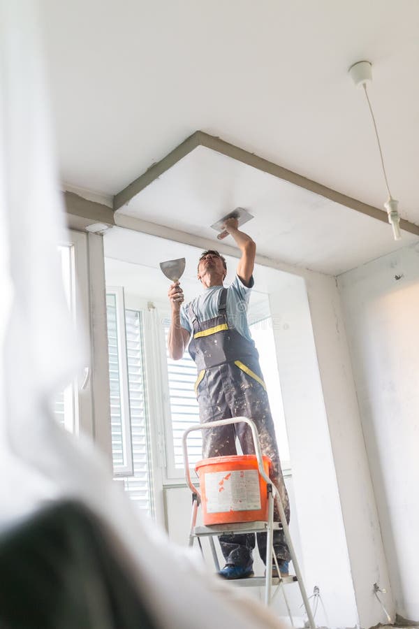 Plasterer Renovating Indoor Walls and Ceilings. Stock Photo - Image of ...