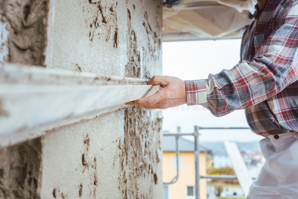 Plasterer Smoothing Plaster on a Facade Stock Image - Image of ...