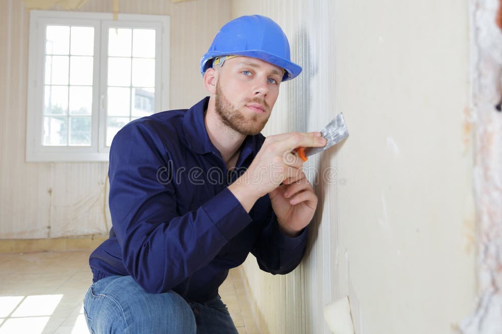 Plasterer Using Scraper on Wall Stock Image - Image of apply, putty ...