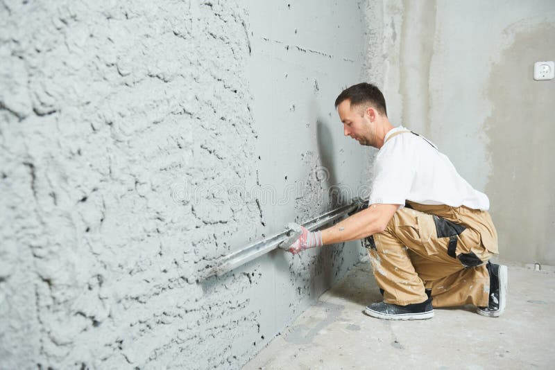 Plasterer Using Screeder Smoothing Putty Plaster Mortar on Wall Stock ...