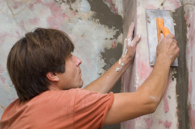 Man Plastering Wall stock photo. Image of mortar, masonry - 24260196