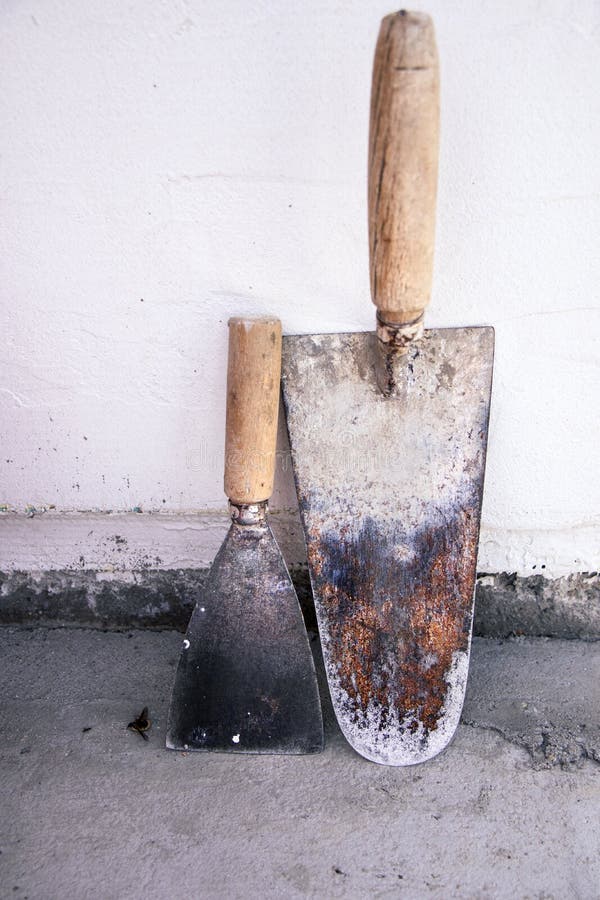 Plastering Tools for Plaster. Plaster Trowel Spatula on Yellow Drywall ...