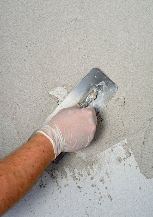 Plastering using a trowel stock image. Image of industry - 65103317
