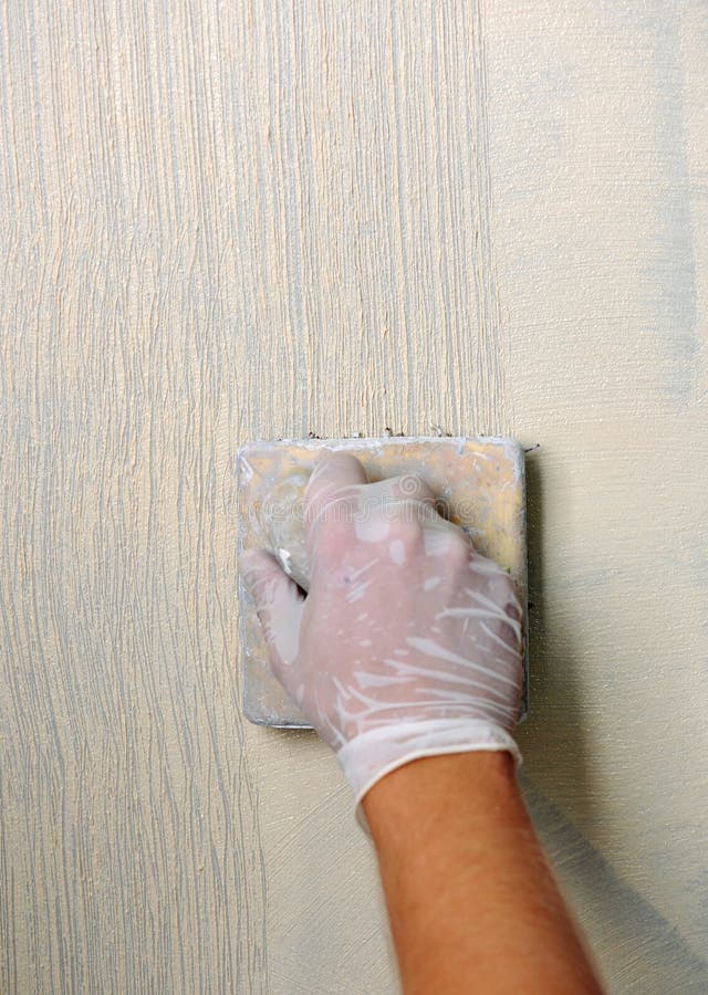 Plastering using a trowel stock photo. Image of work - 65139580