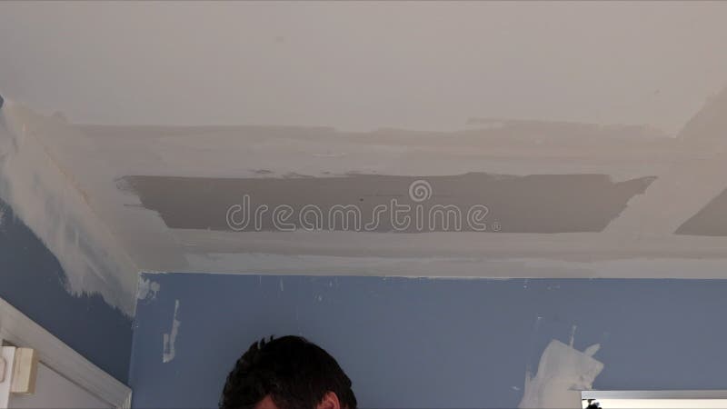 Plastering Wall Coating Putty Plaster on the Ceiling Wall Stock Video ...
