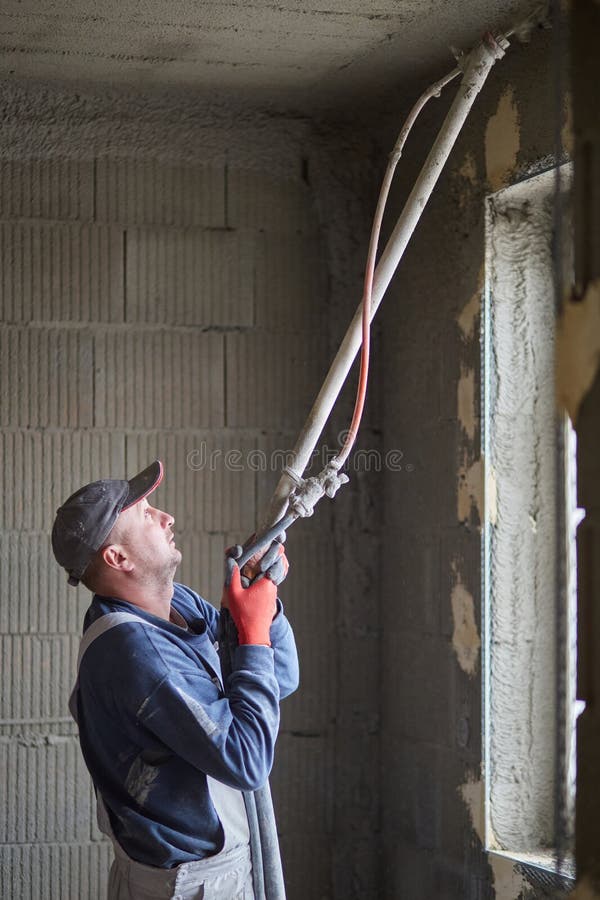 Plastering of Walls for Construction. Application of a Layer of ...