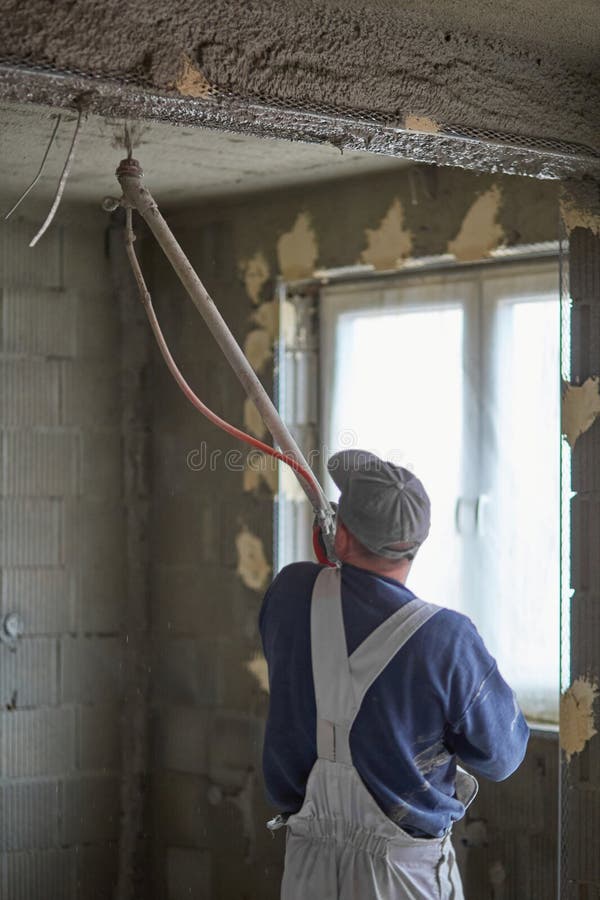 Plastering of Walls for Construction. Application of a Layer of ...