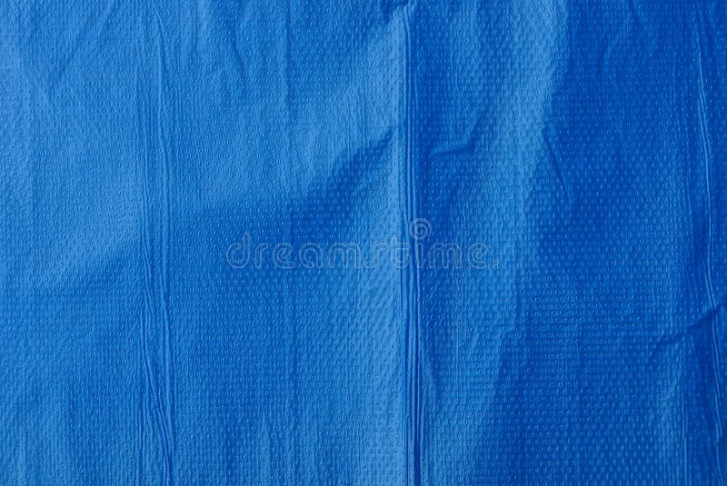 Plastic Texture of a Piece of Crumpled Blue Cellophane Stock Photo ...