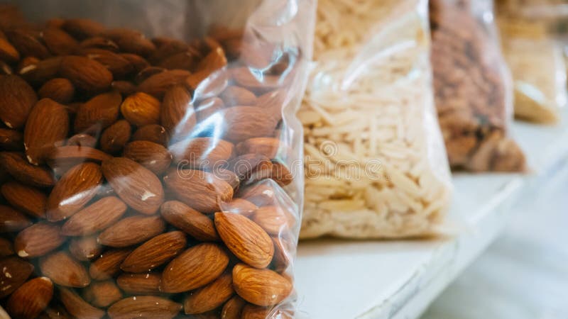 Plastic bag of almonds. stock photo. Image of health - 71109460
