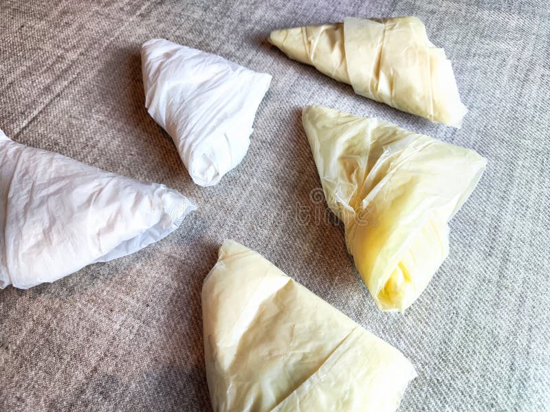 Plastic Bag Folded into a Triangle for Storage. Ways of Storing and ...