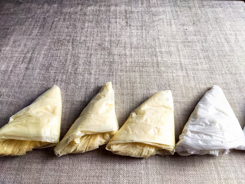 Plastic Bag Folded into a Triangle for Storage. Ways of Storing and ...