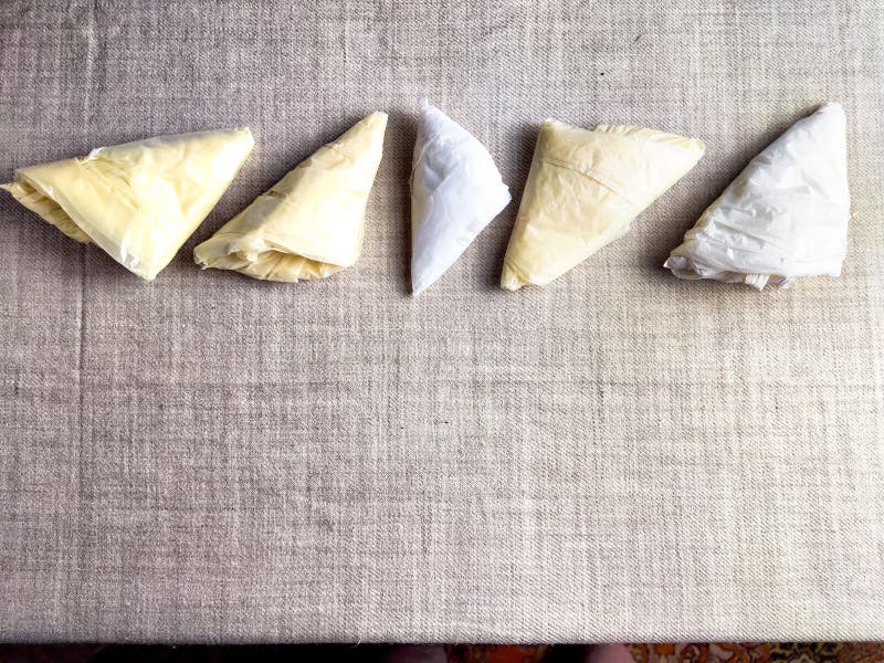 Plastic Bag Folded into a Triangle for Storage. Ways of Storing and ...