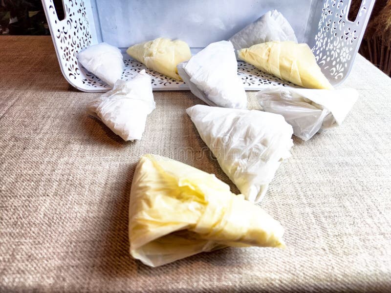 Plastic Bag Folded into a Triangle for Storage. Ways of Storing and ...