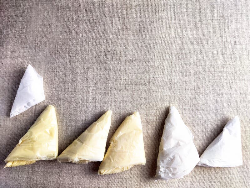 Plastic Bag Folded into a Triangle for Storage. Ways of Storing and ...