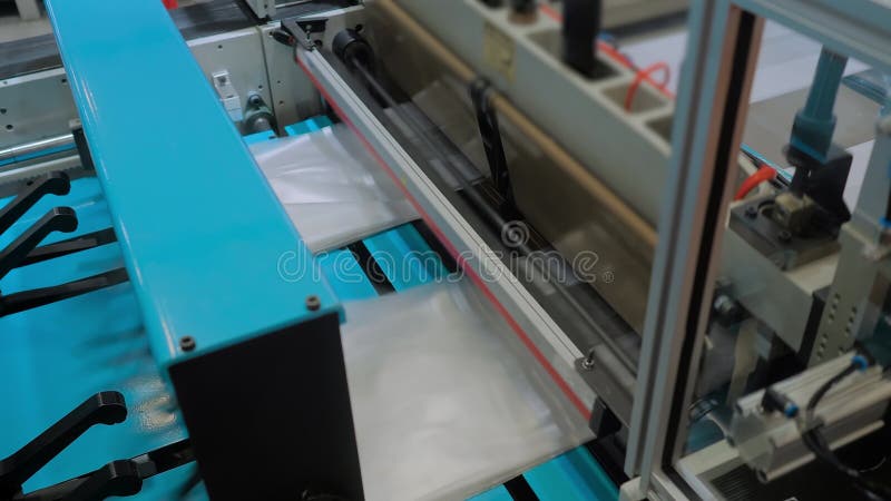 Plastic Bag Making Cutting Machine - Production of Packaging Bags ...