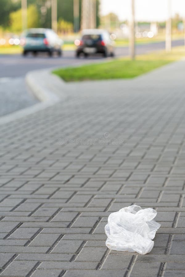 Plastic Bag on the Street, Littering the City. Stock Image - Image of ...