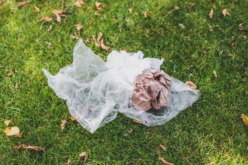 Plastic Bags and Litter Abandoned on Green Lawn, Respecting the ...