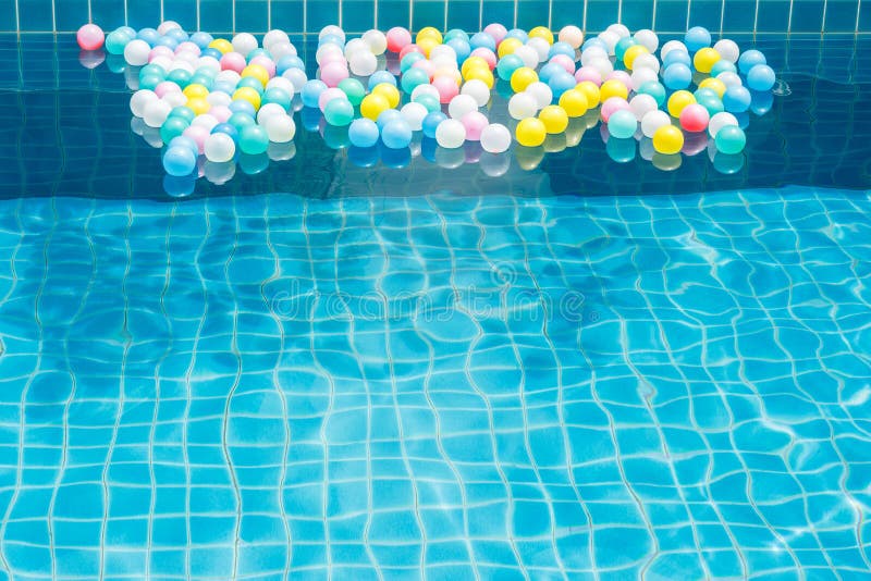 Plastic Balls in Swimming Pool. Stock Photo - Image of yellow ...