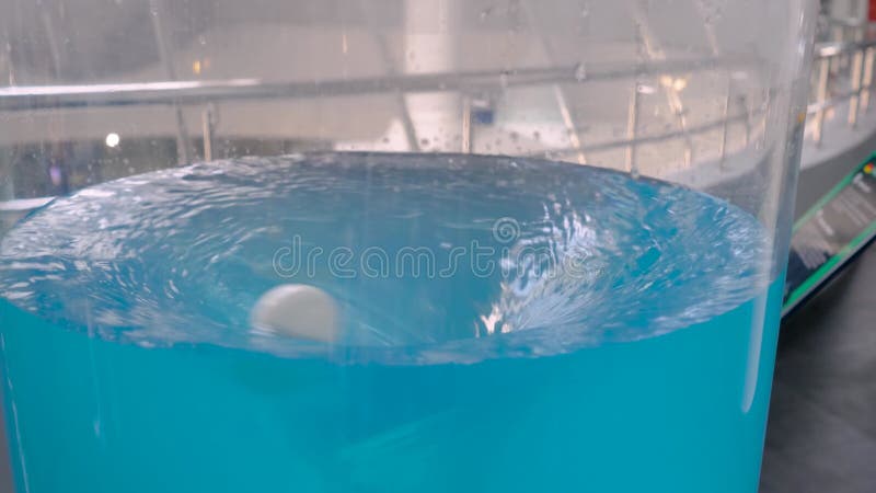 Plastic Balls in Vortex Water Generator at Science Museum - Close Up ...