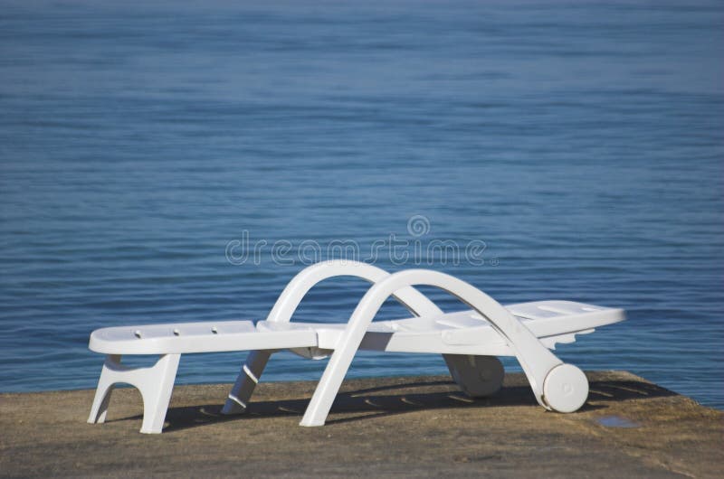 Plastic beach chair stock image. Image of white, place - 5208709