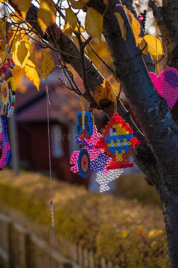 Plastic Bead Art Hanging from a Tree.. Editorial Image - Image of white ...