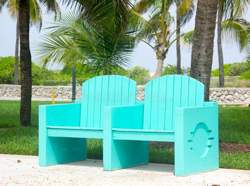 Plastic bench stock photo. Image of beach, tree, serene - 78683984