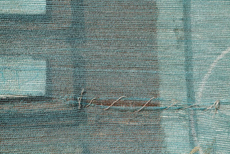 Plastic Blue Grid on the Abandoned House Facade Stock Image - Image of ...