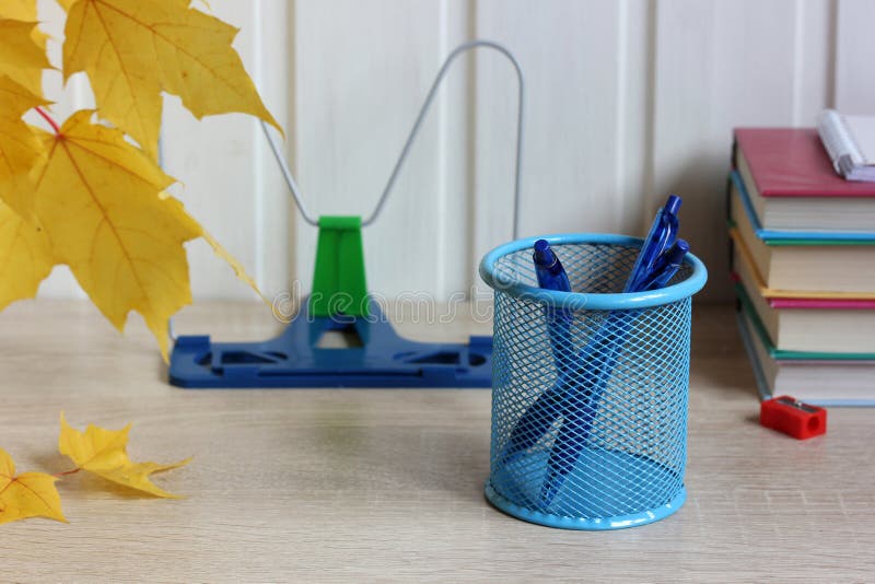 Plastic Blue Pens in a Stand on the Table Stock Photo - Image of yellow ...