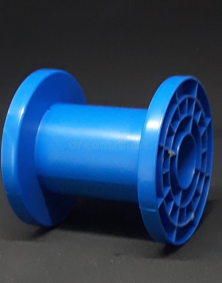 Plastic blue spool stock image. Image of spool, plastic - 129465331