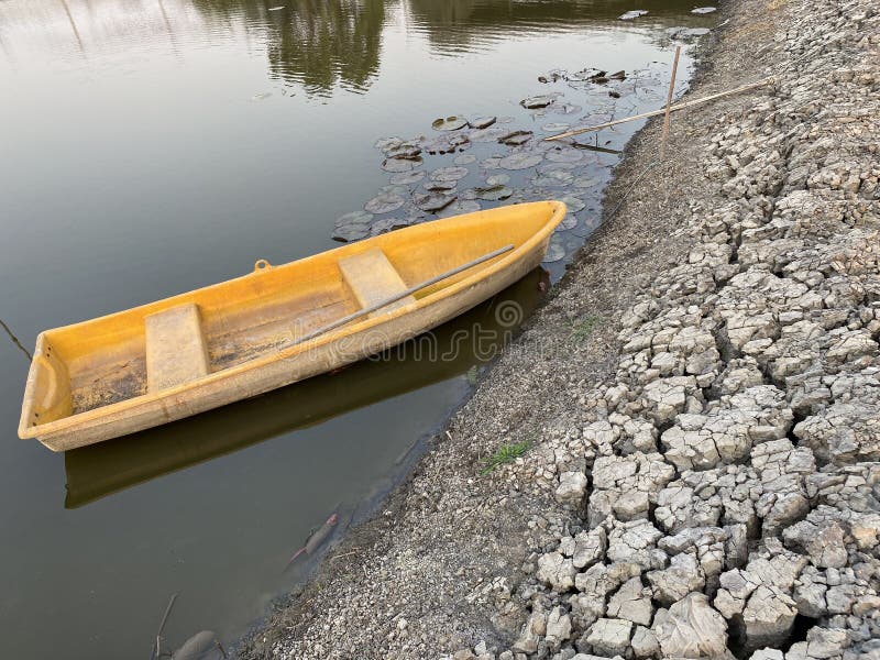 Plastic boat on fish pond stock image. Image of fish - 175144225