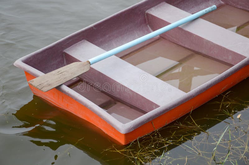 Plastic boat on fish pond stock photo. Image of country - 77953814