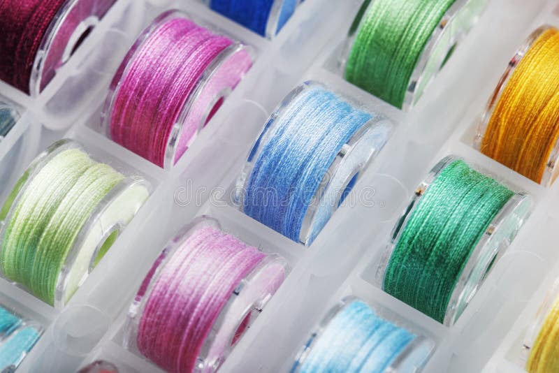 Plastic Bobbins for a Sewing Machine with Multi-colored Threads Stock ...