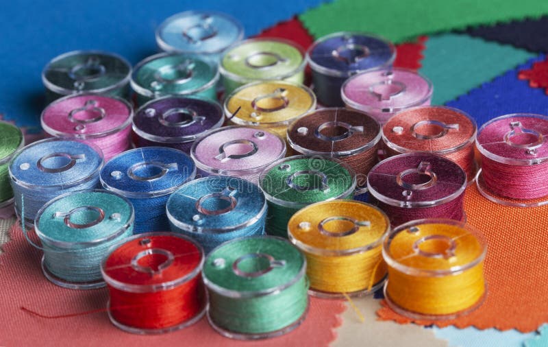 Plastic Bobbins for a Sewing Machine with Multi-colored Threads Stock ...