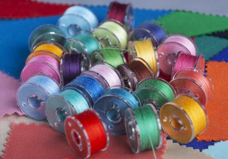 Plastic Bobbins for a Sewing Machine with Multi-colored Threads Stock ...
