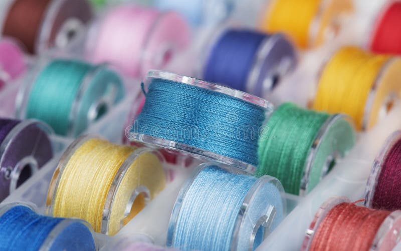 Plastic Bobbins for a Sewing Machine with Multi-colored Threads Stock ...