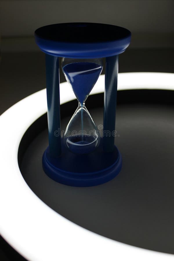 Plastic Body of Blue Time Glass with Sand Pouring Inside in Ring Lamp ...