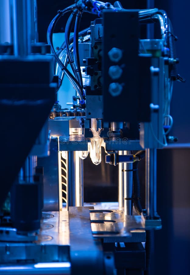 Plastic Bottle Blowing Machine Stock Photo - Image of machining ...